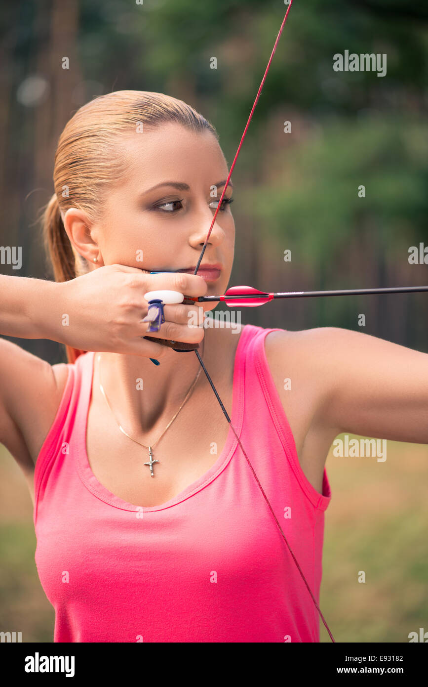Woman with the bow Stock Photo - Alamy