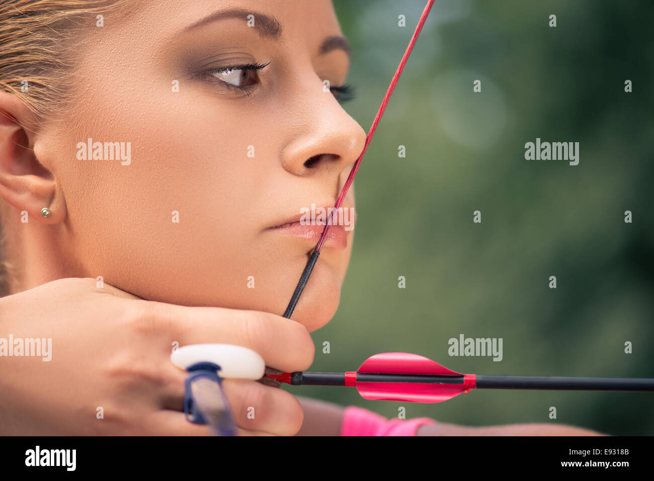 Woman with the bow Stock Photo - Alamy