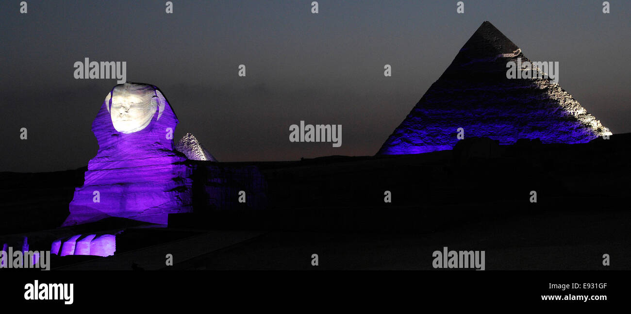 The Great Pyramid and The Great Sphinx of Giza, Egypt, lit up at night ...