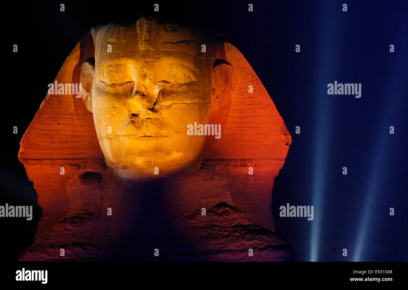 The Great Pyramid and The Great Sphinx of Giza, Egypt, lit up at night ...