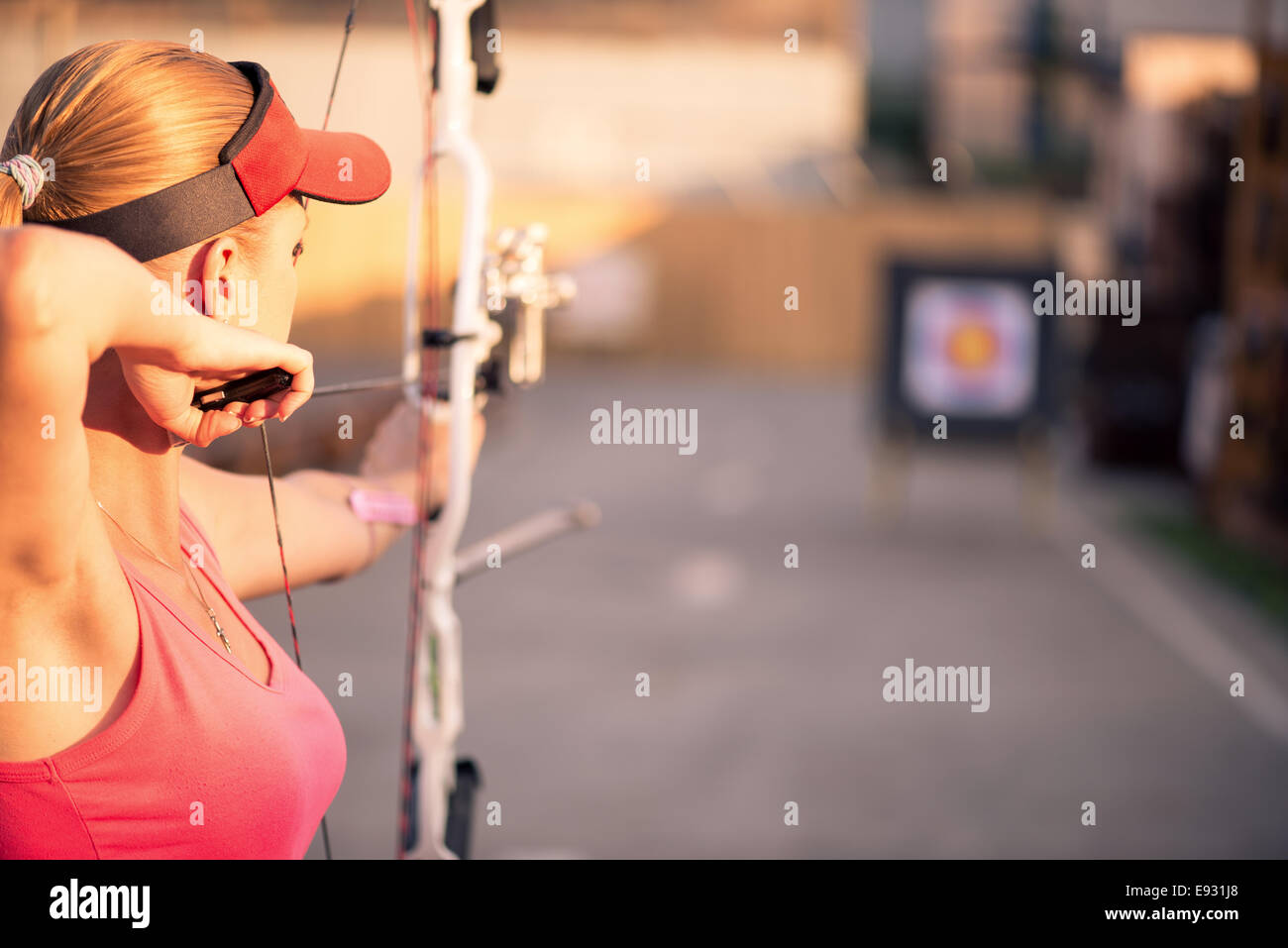 Woman with the bow Stock Photo - Alamy