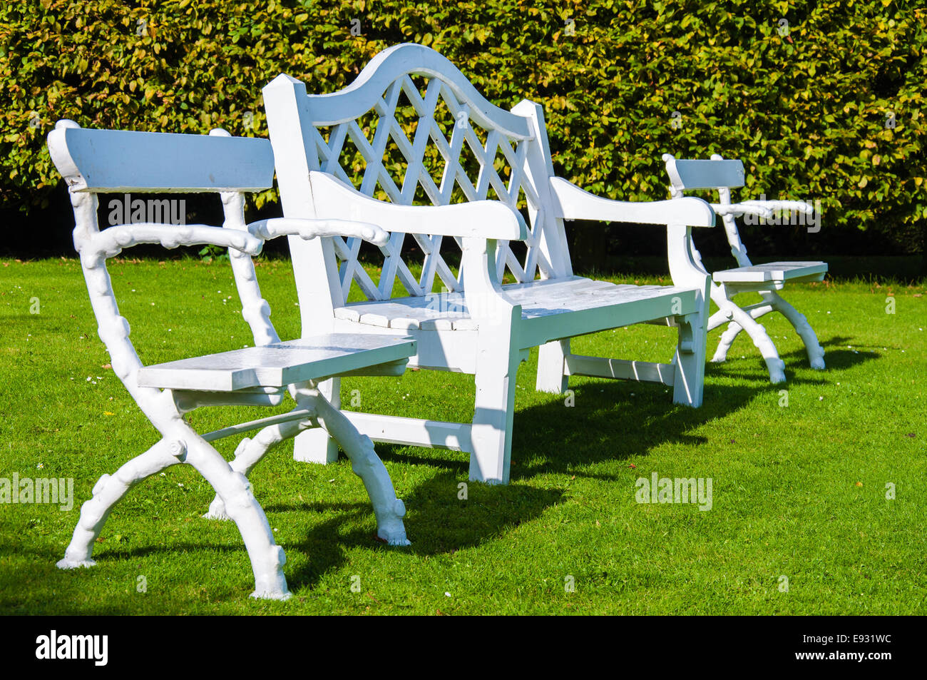 White wooden bench and chairs in countryside English park Stock Photo ...