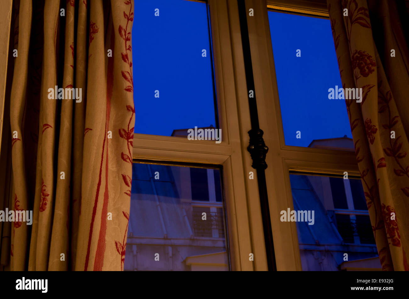 Parisian apartment window at dusk, Paris, France Stock Photo - Alamy