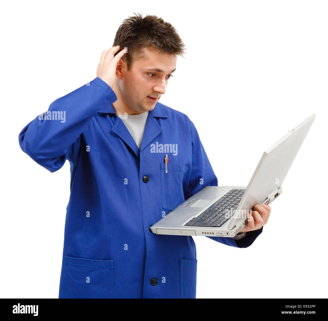 Young worker man with laptop, scratching his head, he doesn't ...
