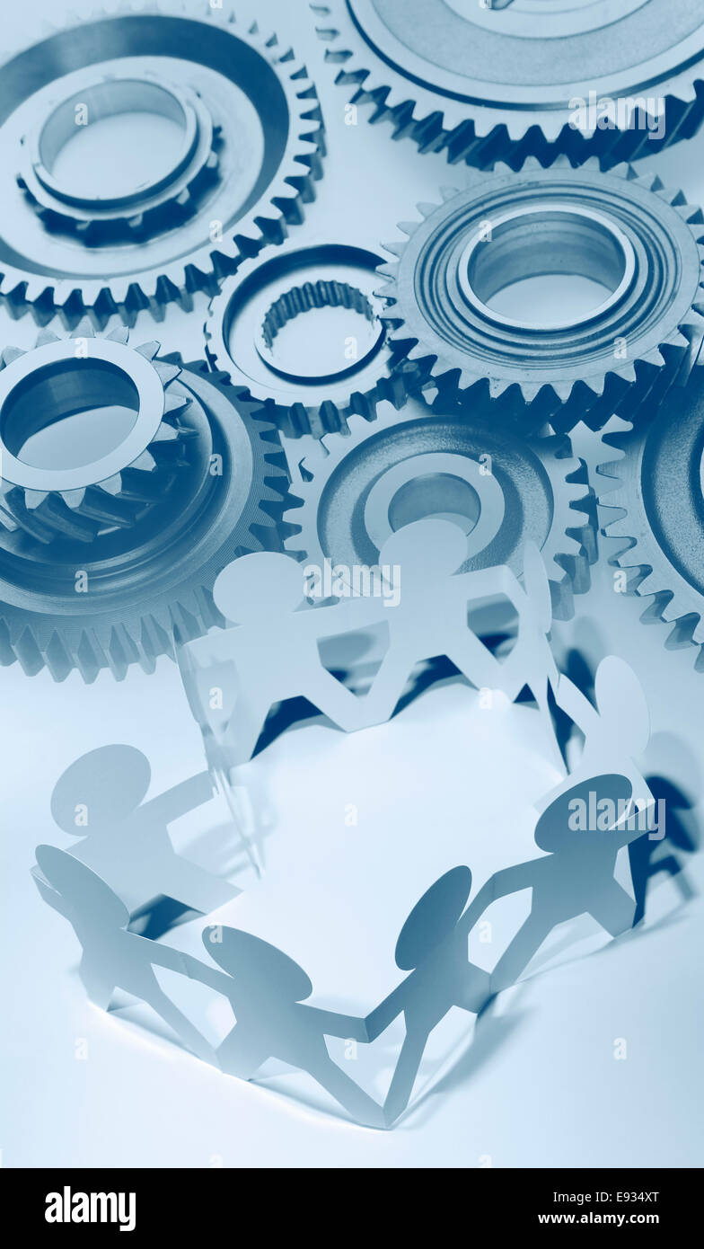 Gears and team. Teamwork concept Stock Photo - Alamy