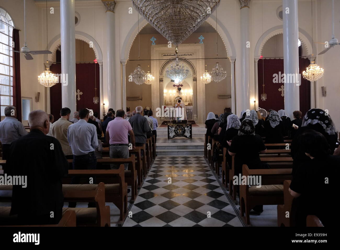 Syrian Christians taking part in a mass ceremony at an Orthodox Stock ...