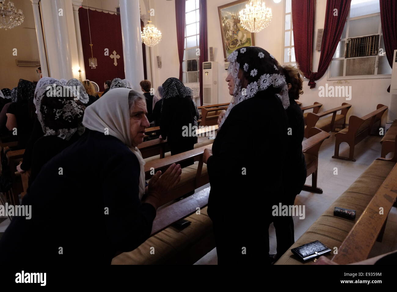 Syrian Christians worshipers taking part in a mass ceremony at the ...