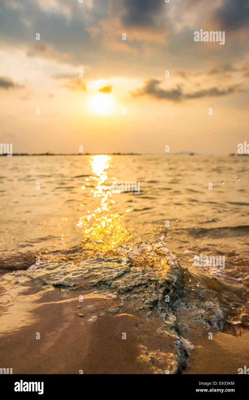 the motion of wave on the beach Stock Photo - Alamy