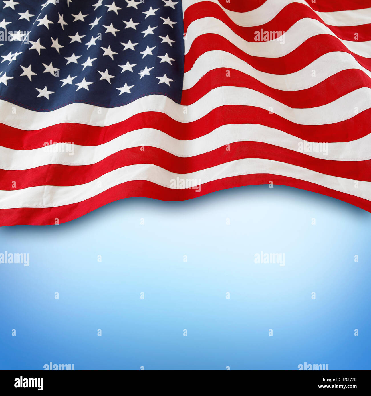 American flag on blue background Stock Photo - Alamy