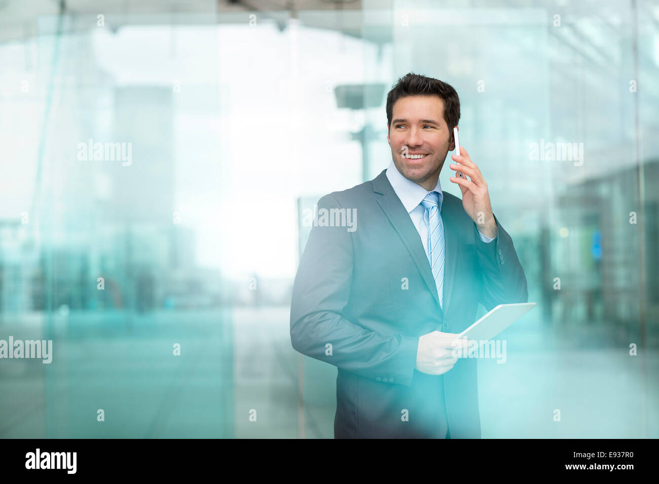 Businessman using a Mobile Phone Stock Photo - Alamy