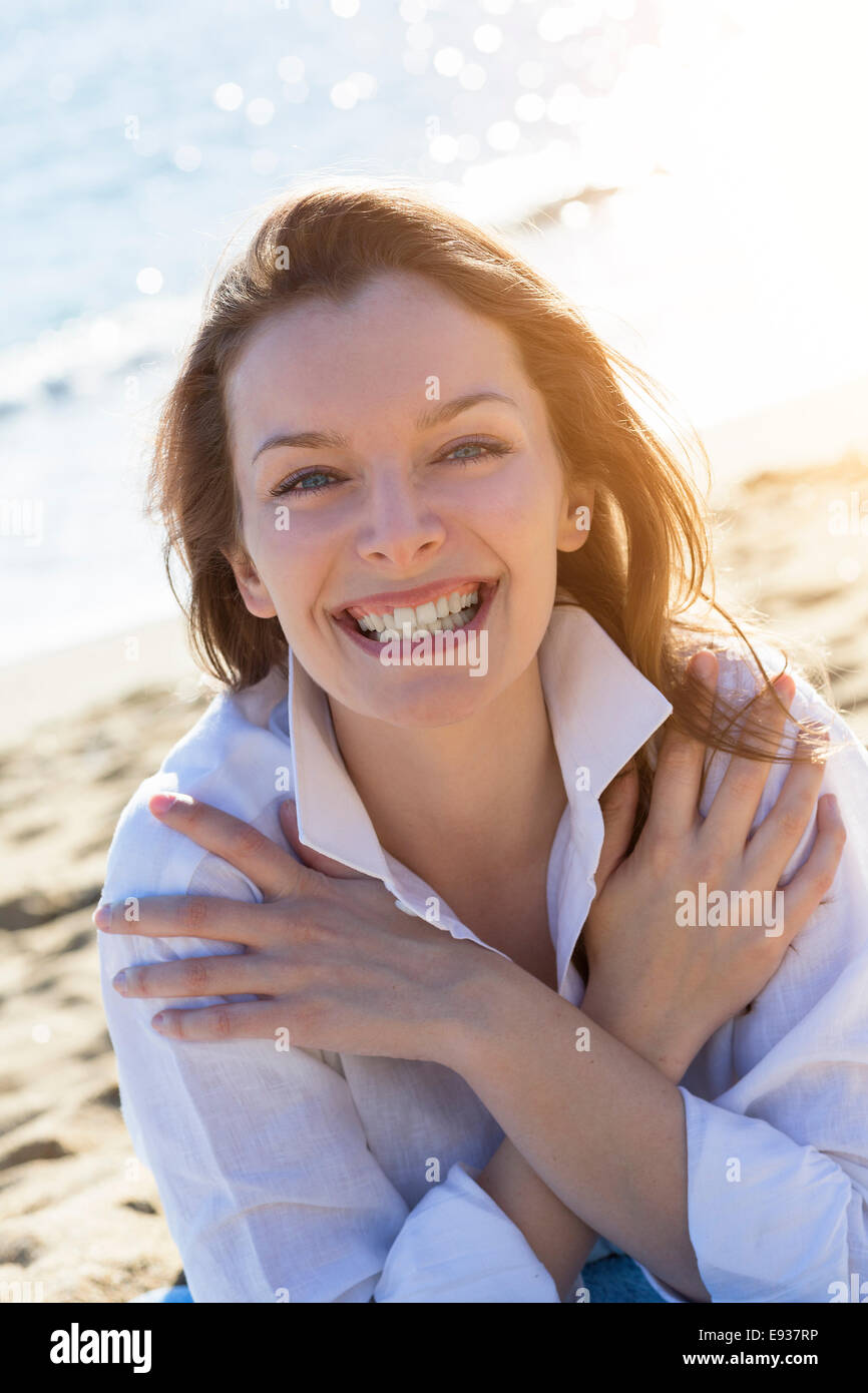 Portrait of woman on the beach Stock Photo - Alamy