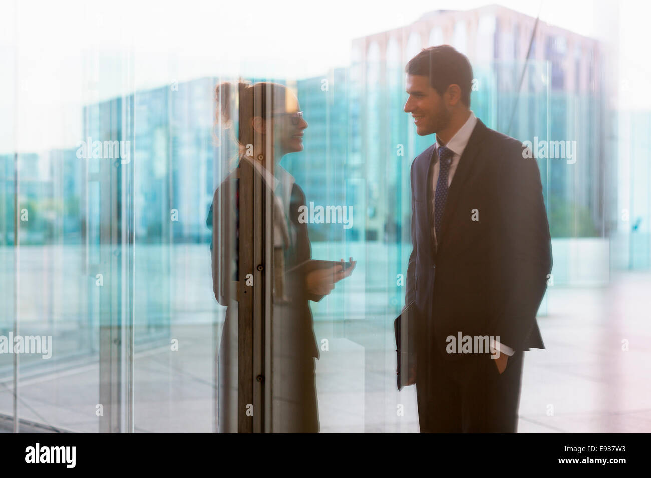 Business people talking Stock Photo - Alamy