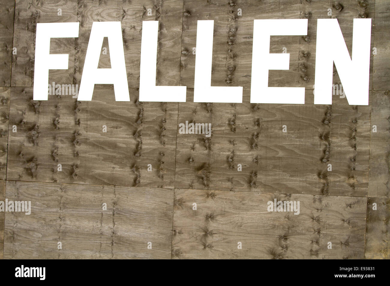 Fallen wooden boards large white letters street Stock Photo - Alamy