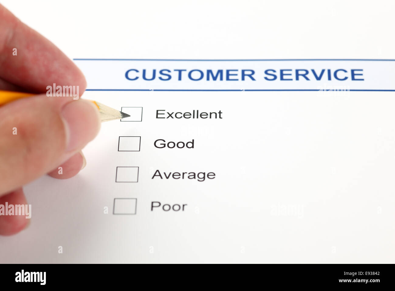 Quality survey and human hand with pencil Stock Photo - Alamy