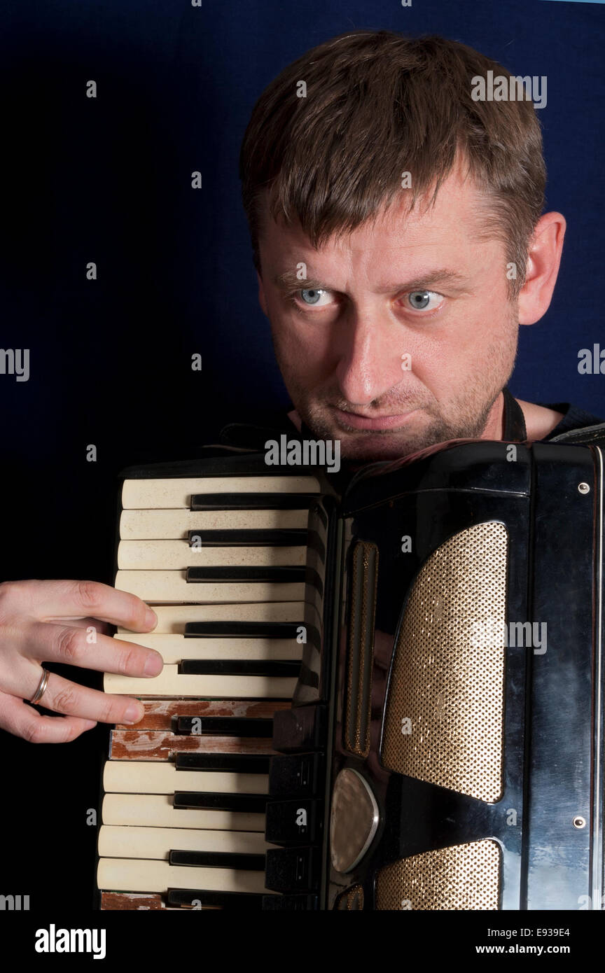 Learning Play Harmonica Stock Photo - Alamy