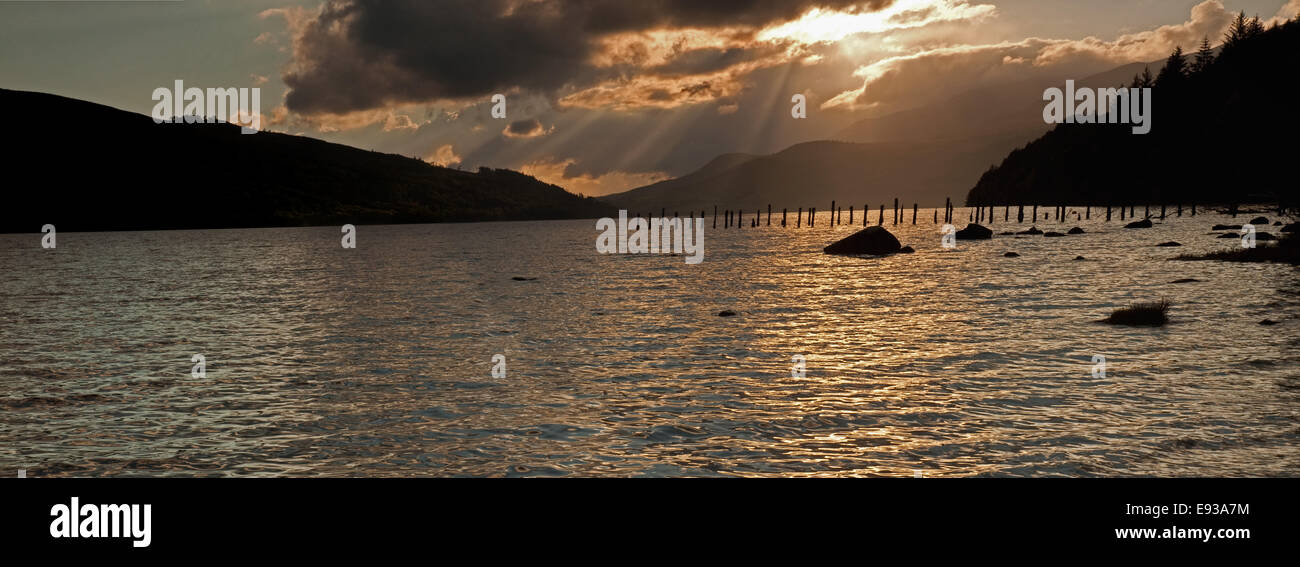 Sunset over Loch Tay Crannog remains panoramic Stock Photo - Alamy