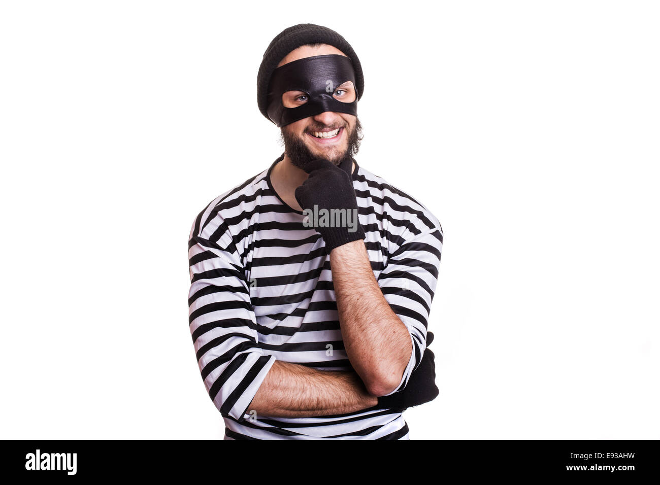 Crafty criminal smiling and thinking. Portrait isolated on white ...