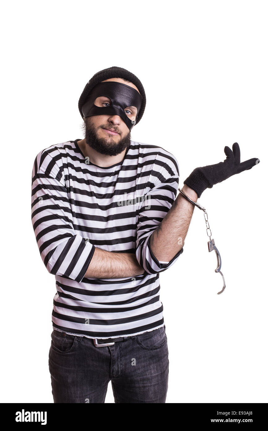 Thief arrested as a consequence of his crime. Portrait isolated on ...