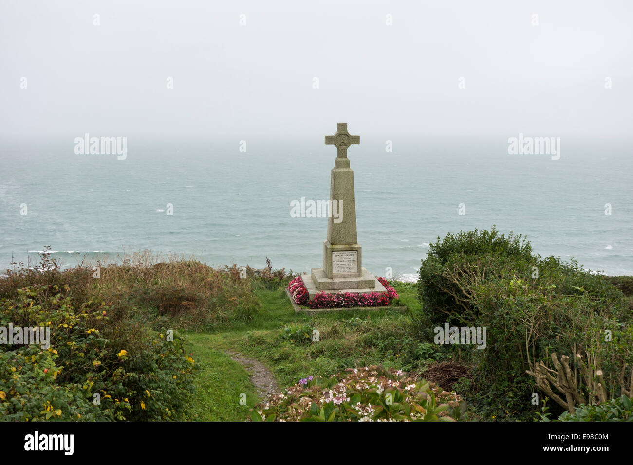 Granite memorial cross on the South West Coast Path in Cornwall Stock ...