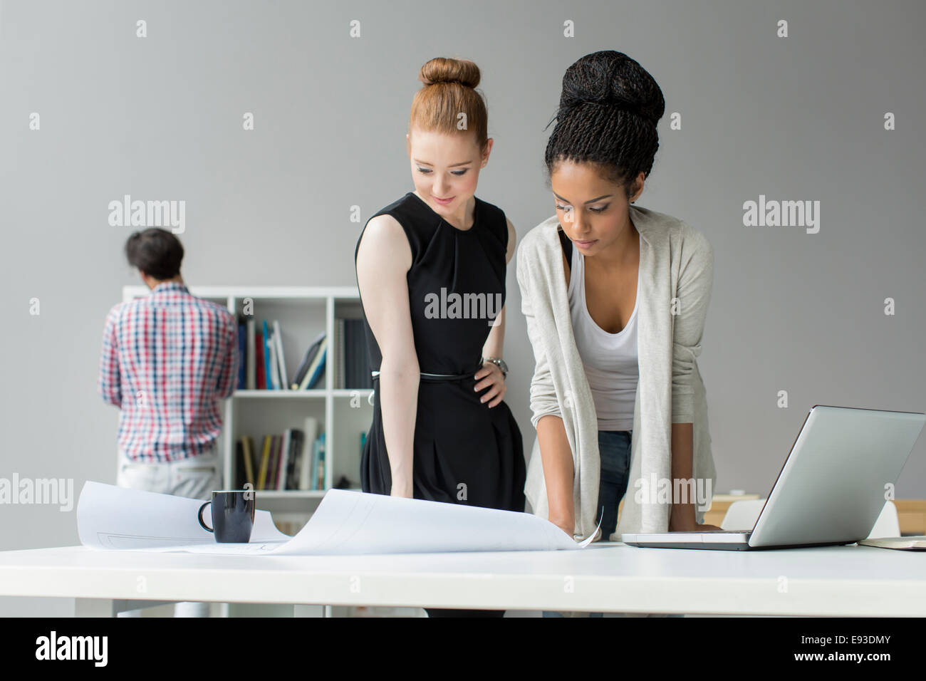 Young people in the office Stock Photo - Alamy