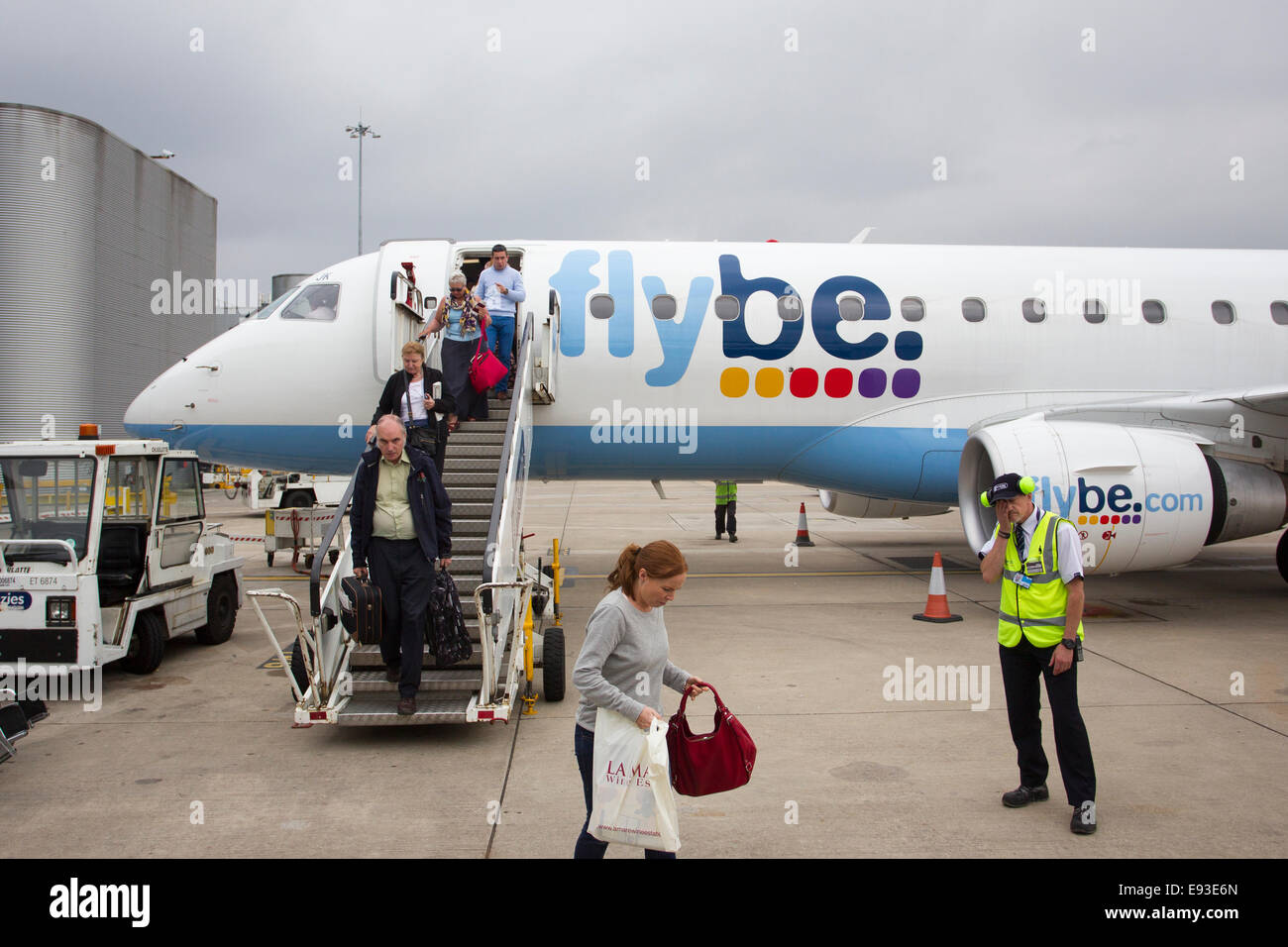 Flybe arrivals - arriving at Manchester Airport Stock Photo - Alamy