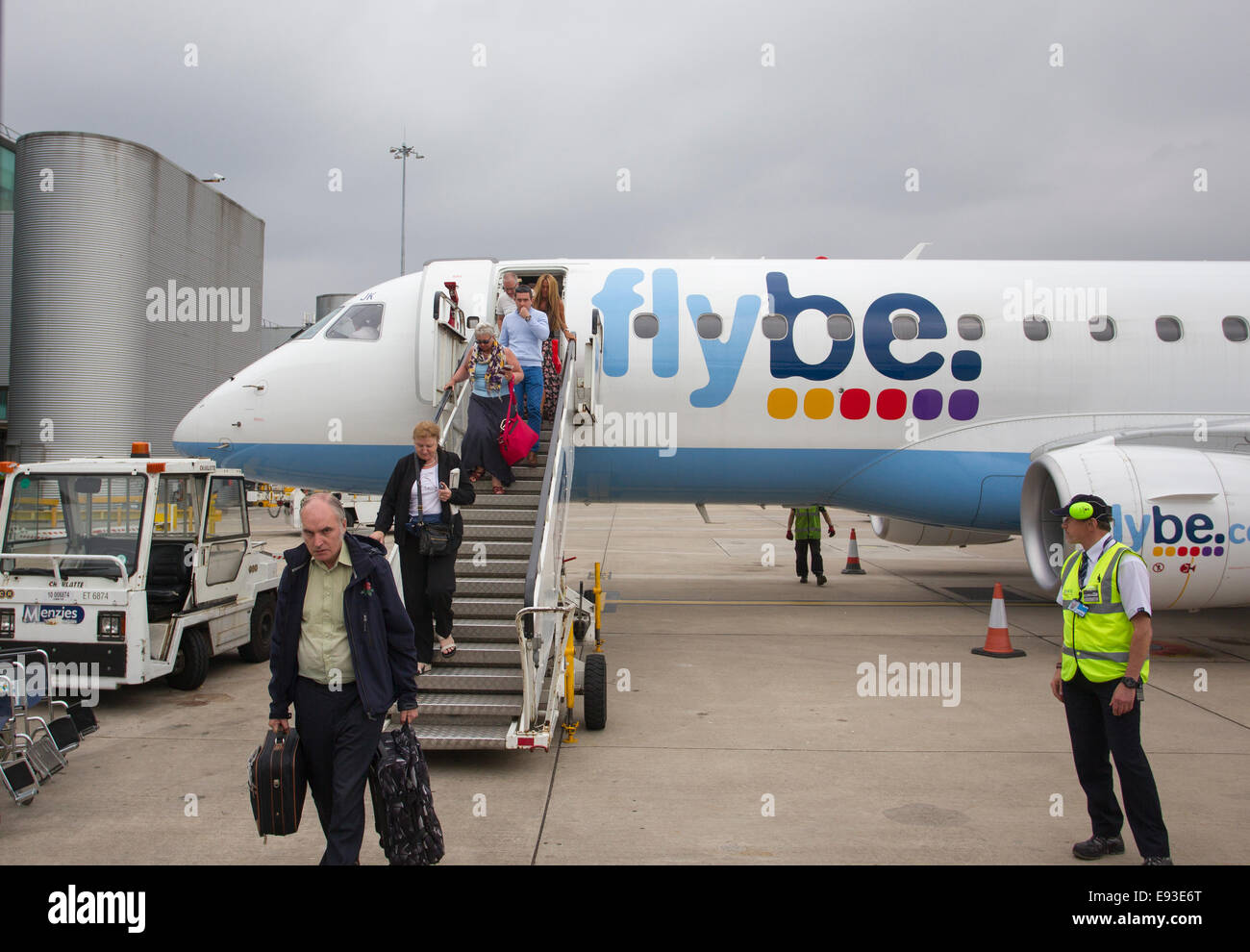 Flybe arrivals - arriving at Manchester Airport Stock Photo - Alamy