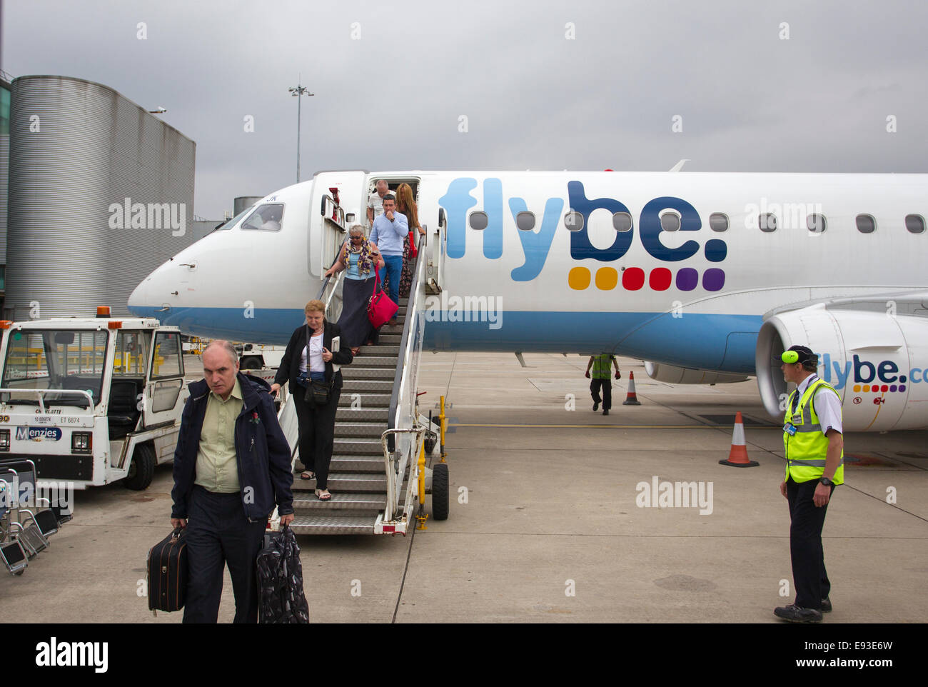 Flybe arrivals - arriving at Manchester Airport Stock Photo - Alamy