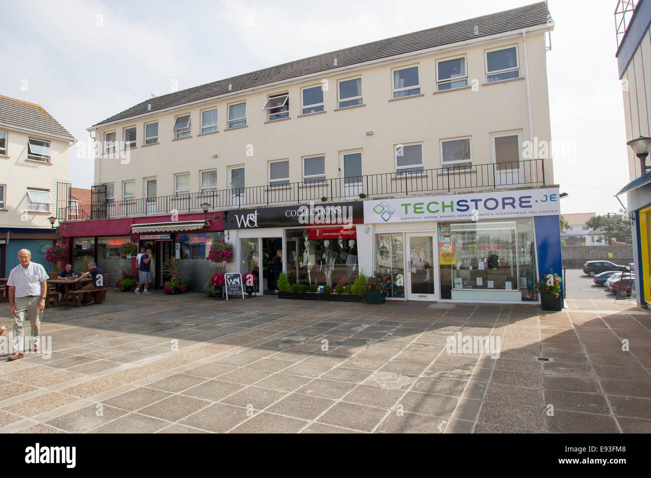 Parade shops stores shopping small shops St. Brelade Stock Photo - Alamy