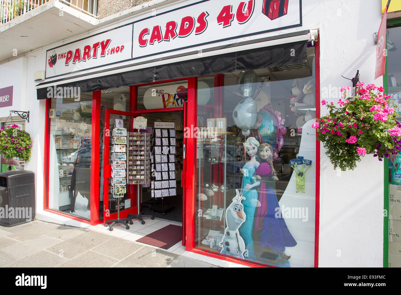 Parade shops stores shopping small shops St. Brelade Stock Photo - Alamy