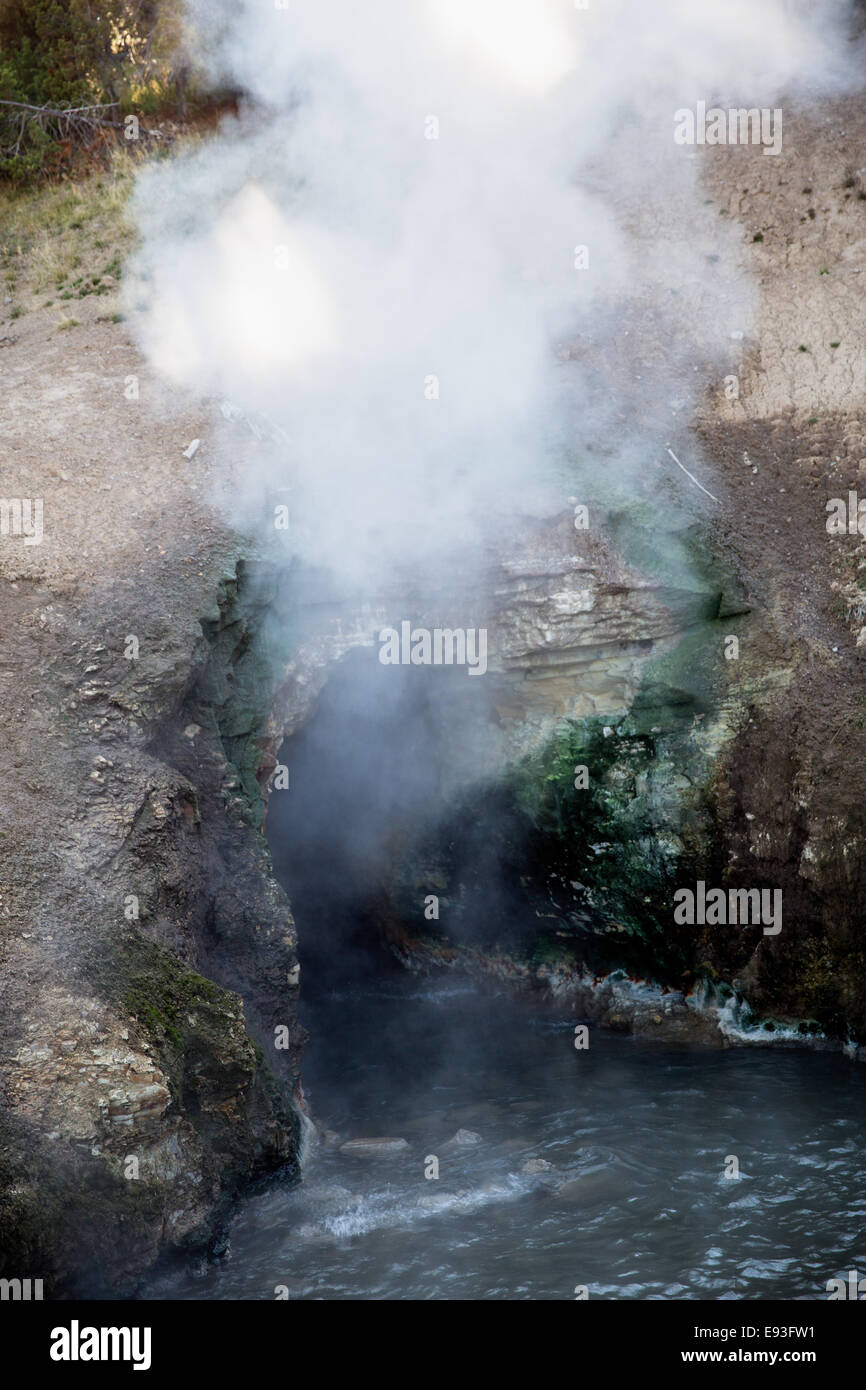 Dragon's Mouth Spring in the Mud Volcano geothermal area of Yellowstone ...