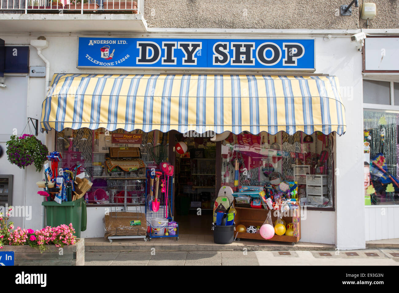 Parade shops stores shopping small shops St. Brelade Stock Photo - Alamy