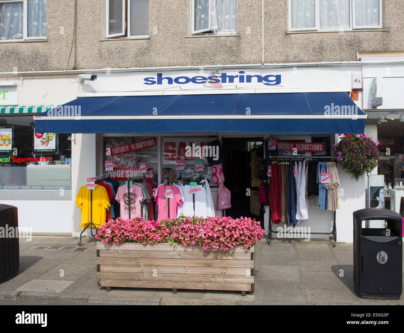 Parade shops stores shopping small shops St. Brelade Stock Photo - Alamy