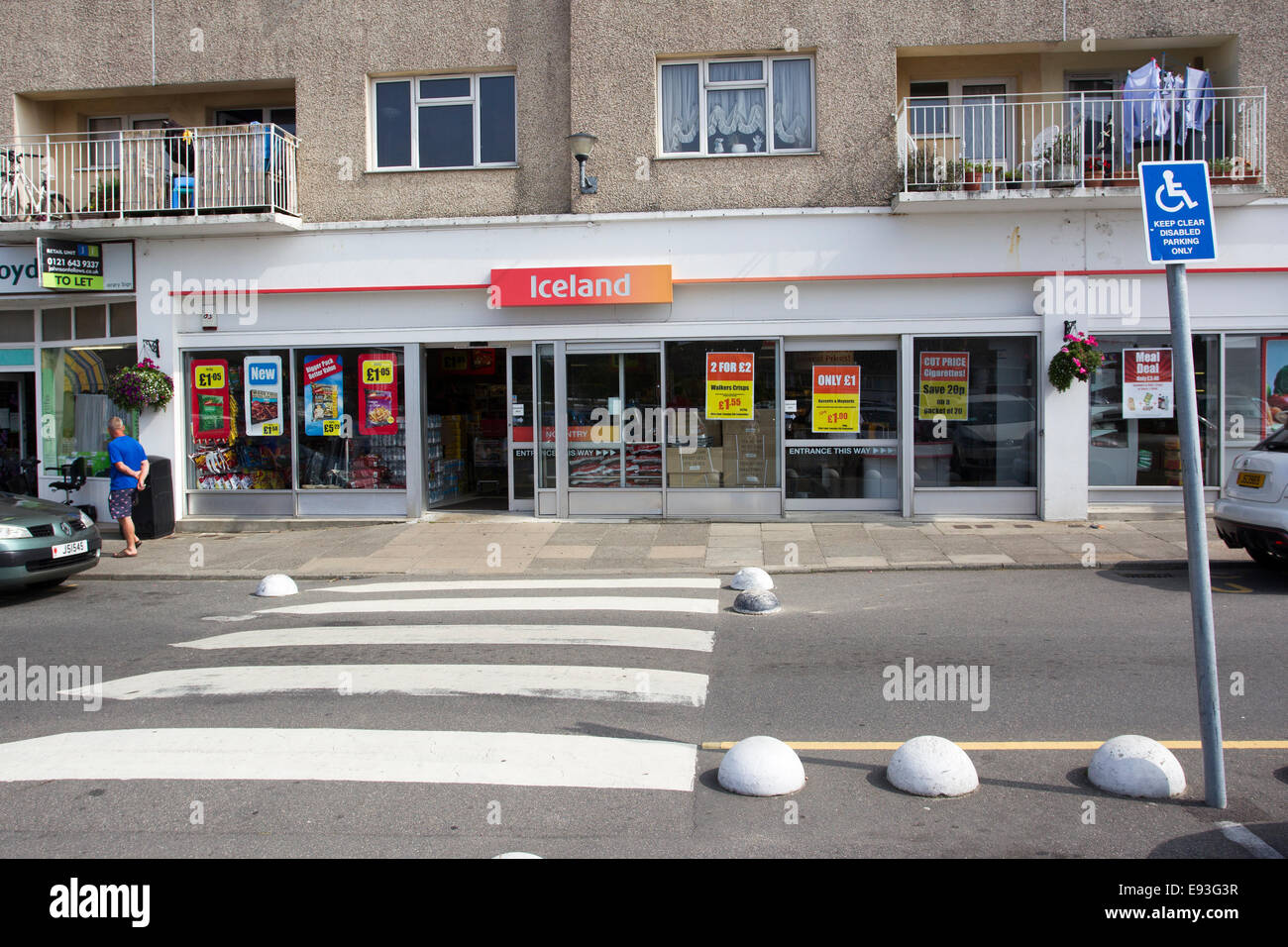 Parade shops stores shopping small shops St. Brelade Stock Photo - Alamy