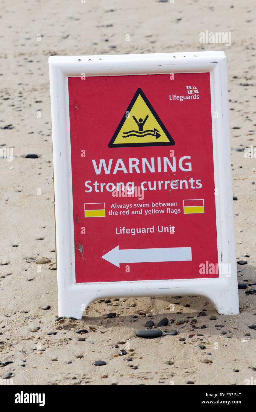 Always swim between the red and yellow flags hi-res stock photography ...