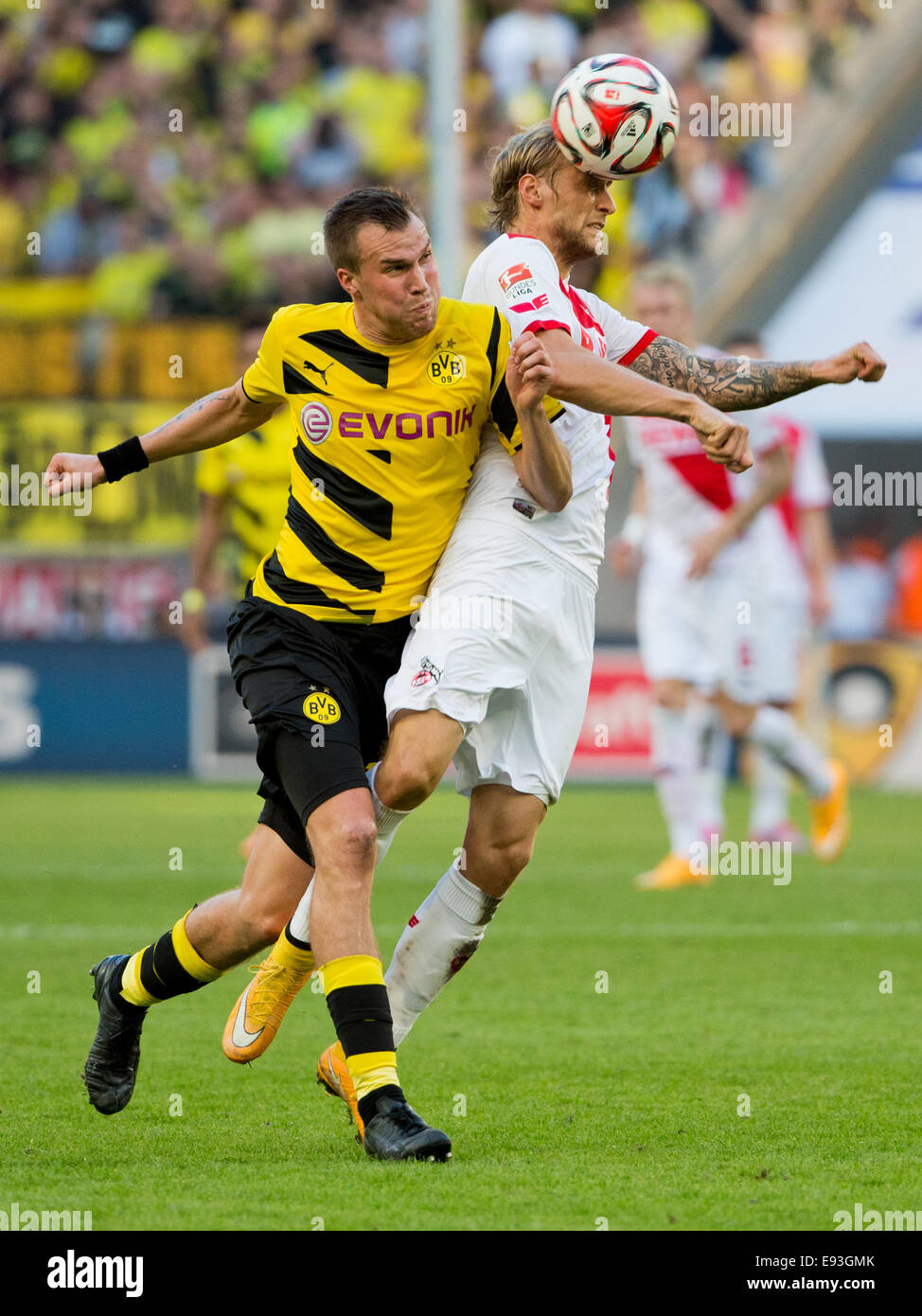 Cologne, Germany. 18th Oct, 2014. Cologne's Marcel Risse (R) and ...