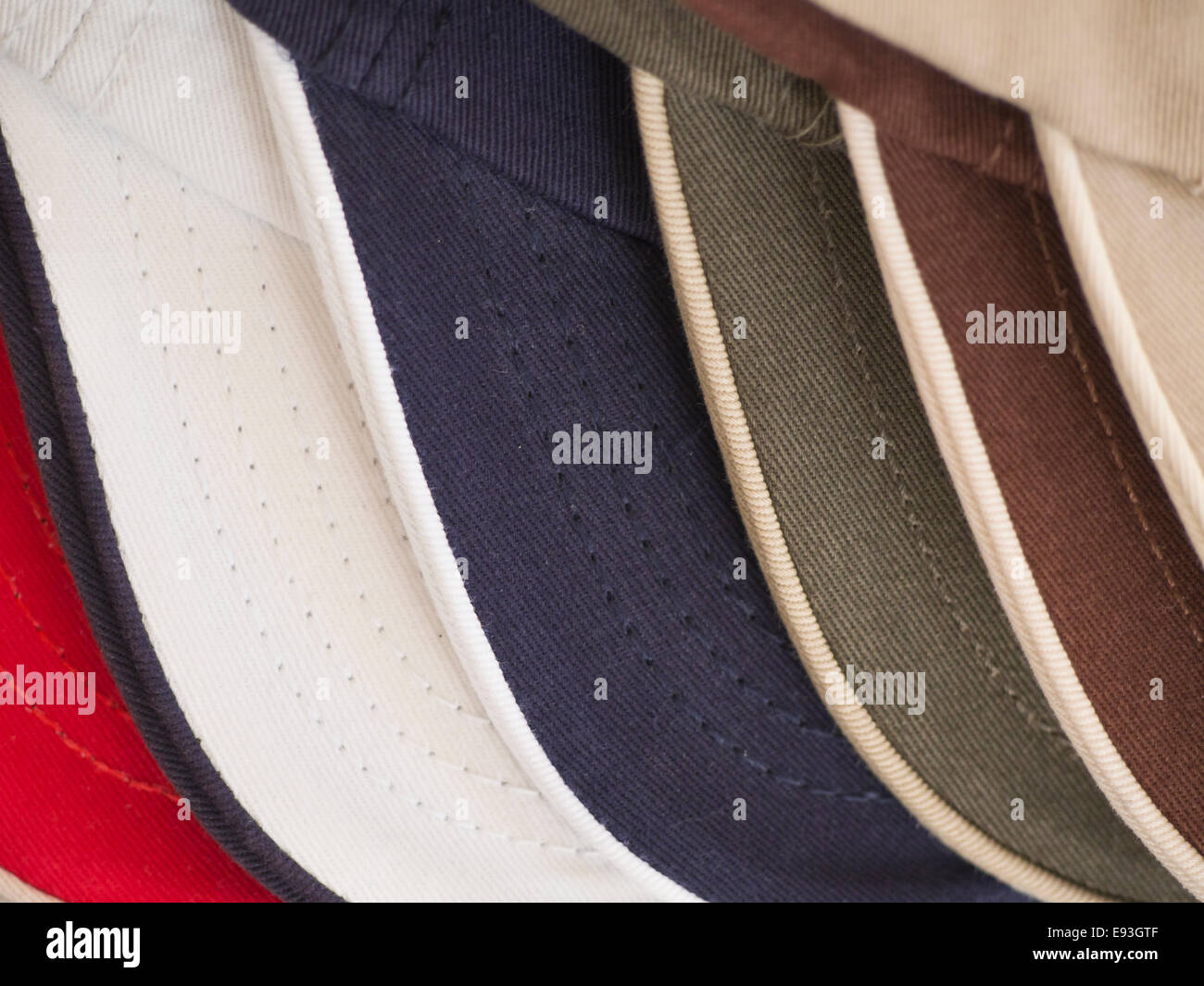 close up of sun shade on baseball caps ready for tourists on summer ...