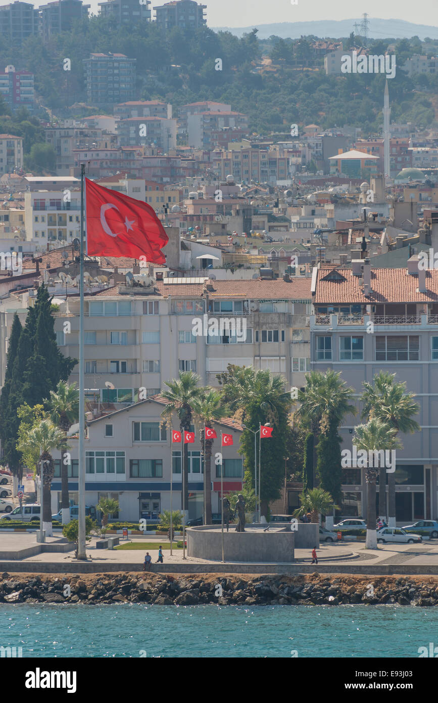Turkish flags flying on the promenade in Kusadasi, Turkey against a ...