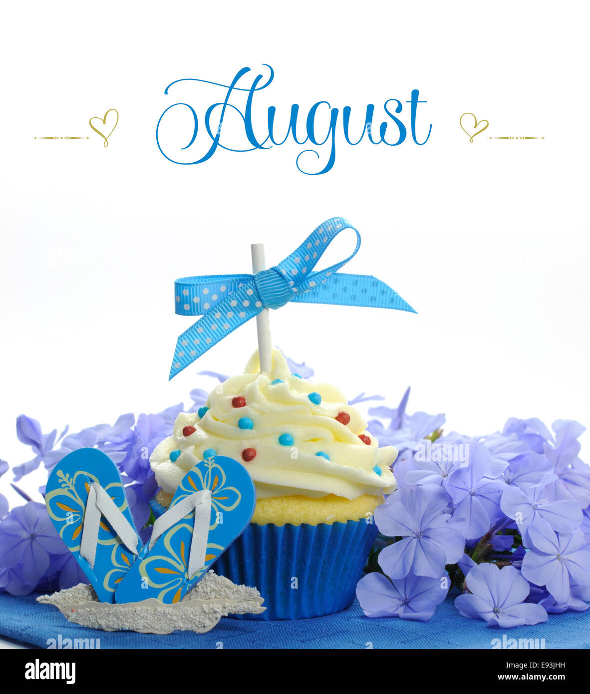 Beautiful blue Summer holiday theme cupcake with seasonal flowers and ...