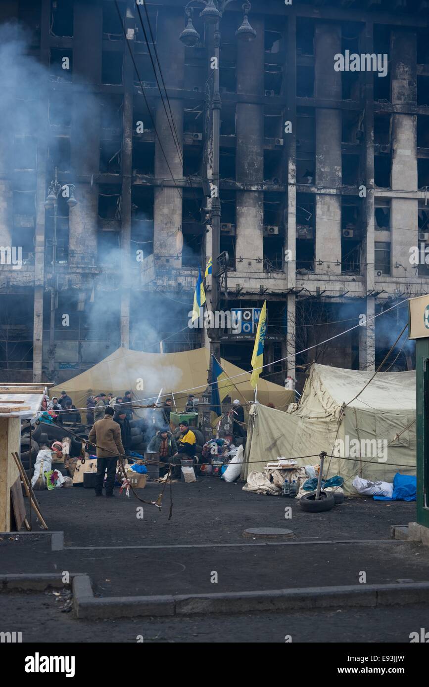 Peace camp in front of a burned out building after the Maidan riots in ...