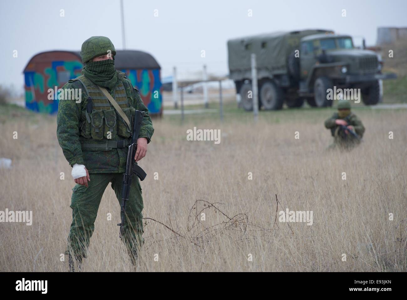 Russian "Ghost Army" troops - with no identifying insignia, stand guard ...