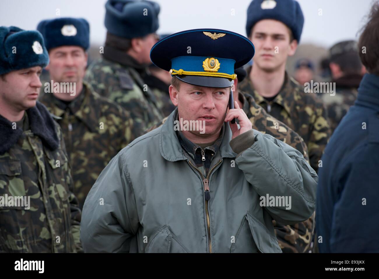 Belbek airbase commander Yuli Manchur talks on the phone whilst ...