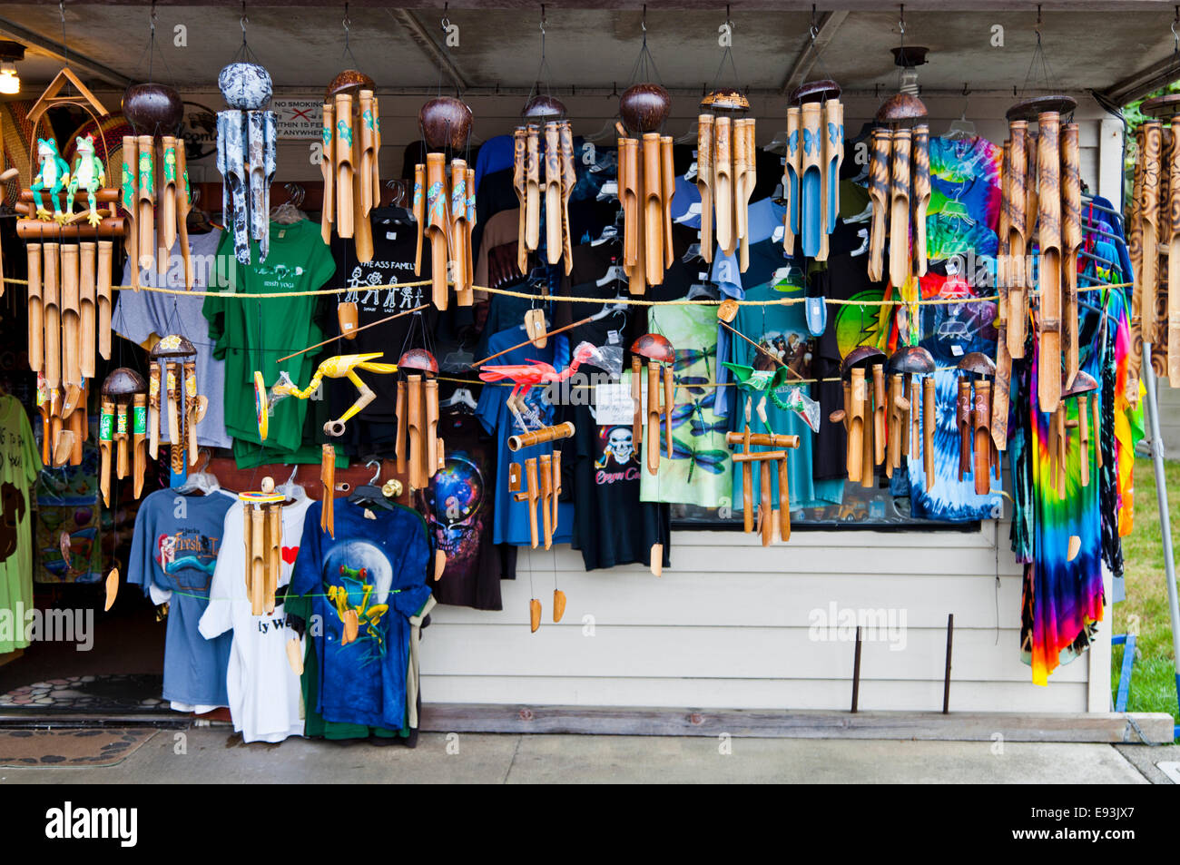 Wind chimes and other gifts hang outside a gift shop in Bandon, Oregon ...