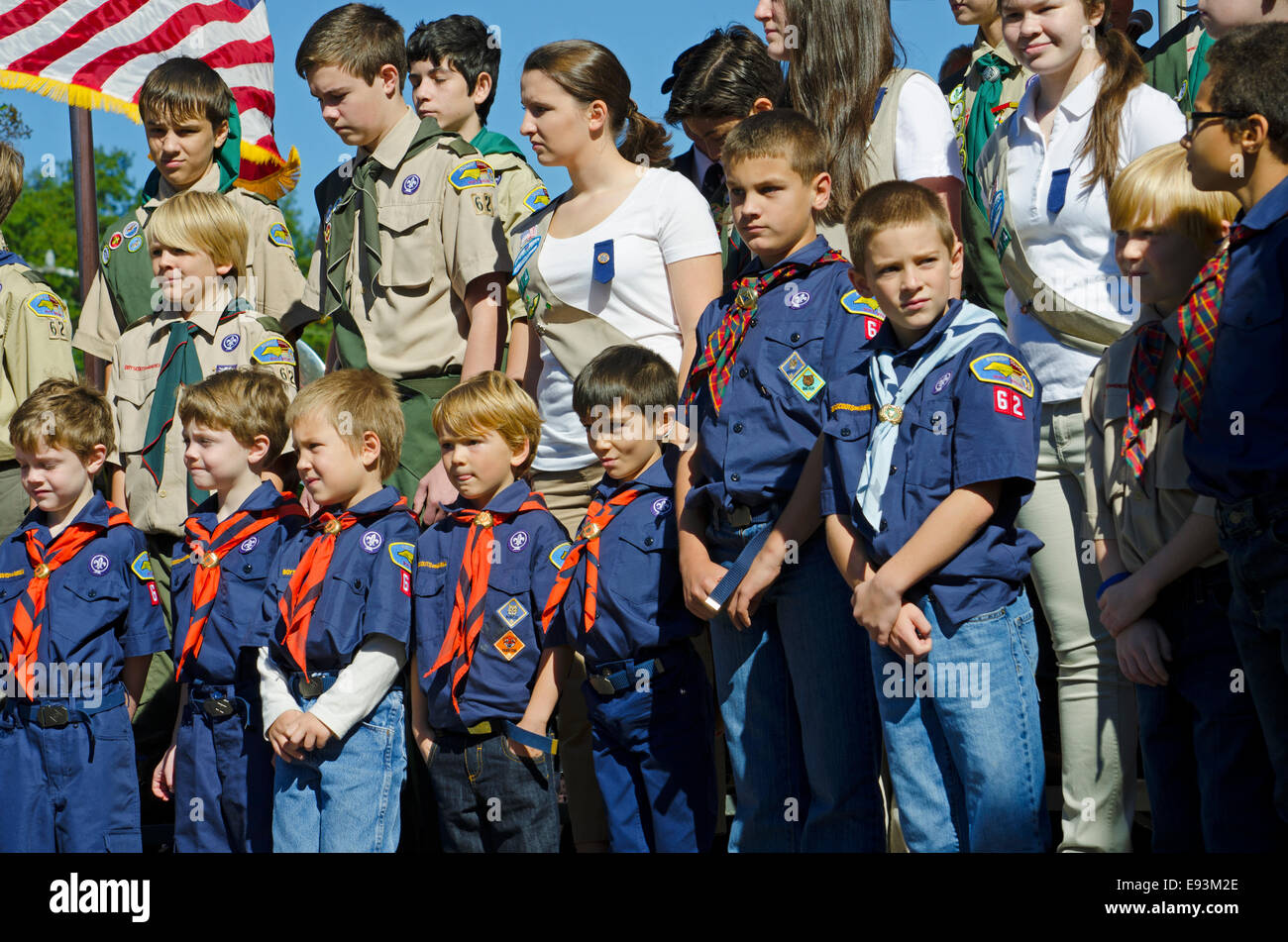 Boy Scouts, Girl Scouts and Cub Scouts of America stand at attention ...