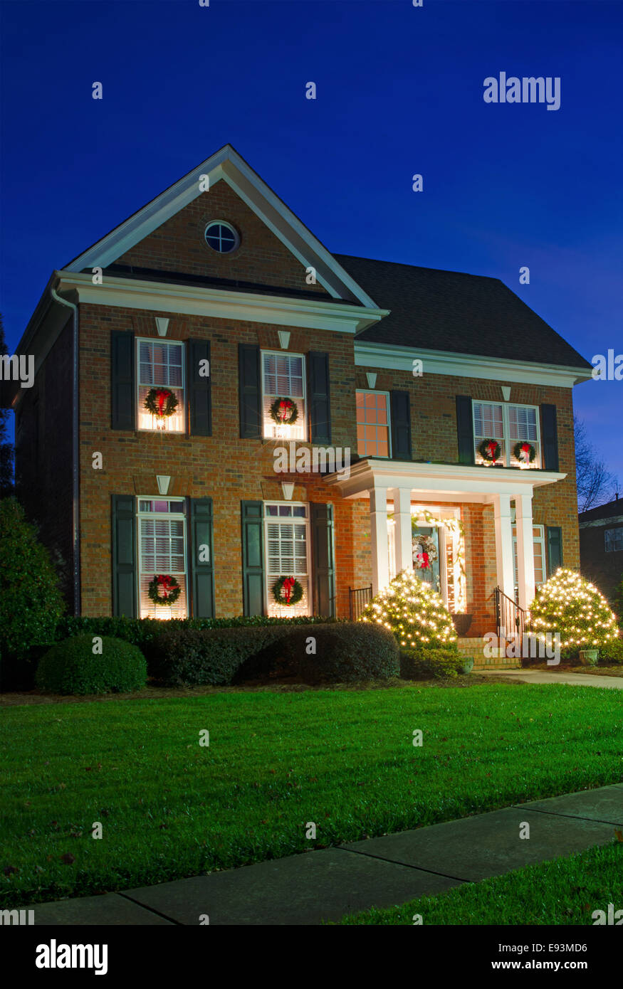 This traditional, Victorian-style brick home in a Christmas town ...