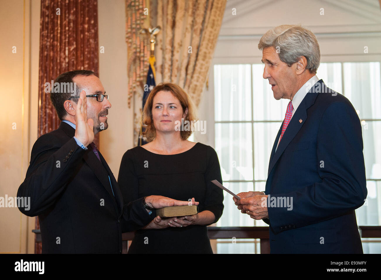 With his wife, Holly Holzer Bass, looking on, U.S. Secretary of State ...