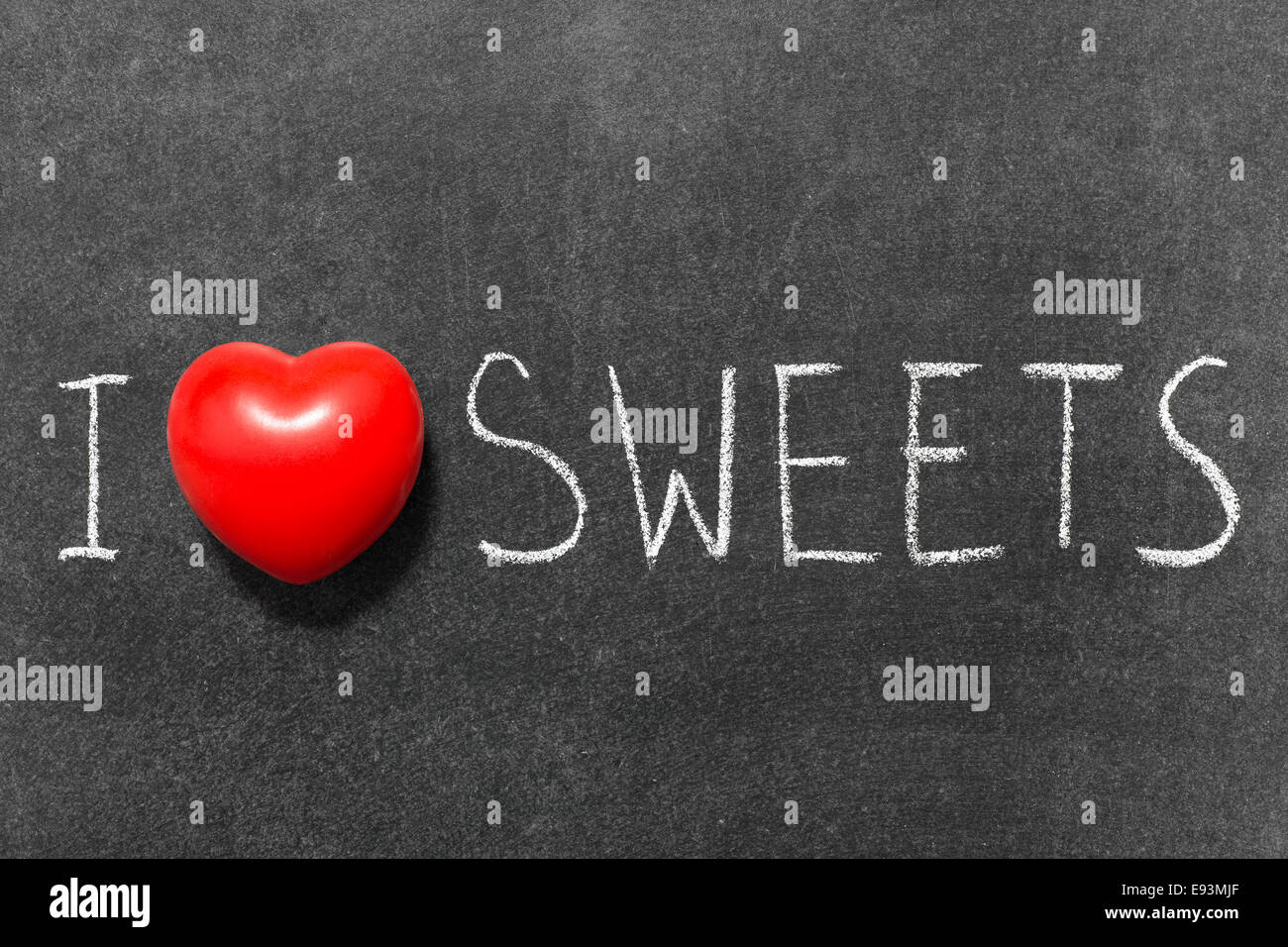 I love sweets phrase handwritten on school blackboard Stock Photo - Alamy