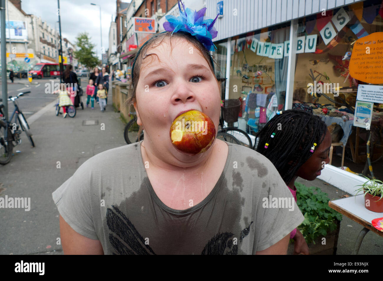 Girl bobbing for apple hi-res stock photography and images - Alamy