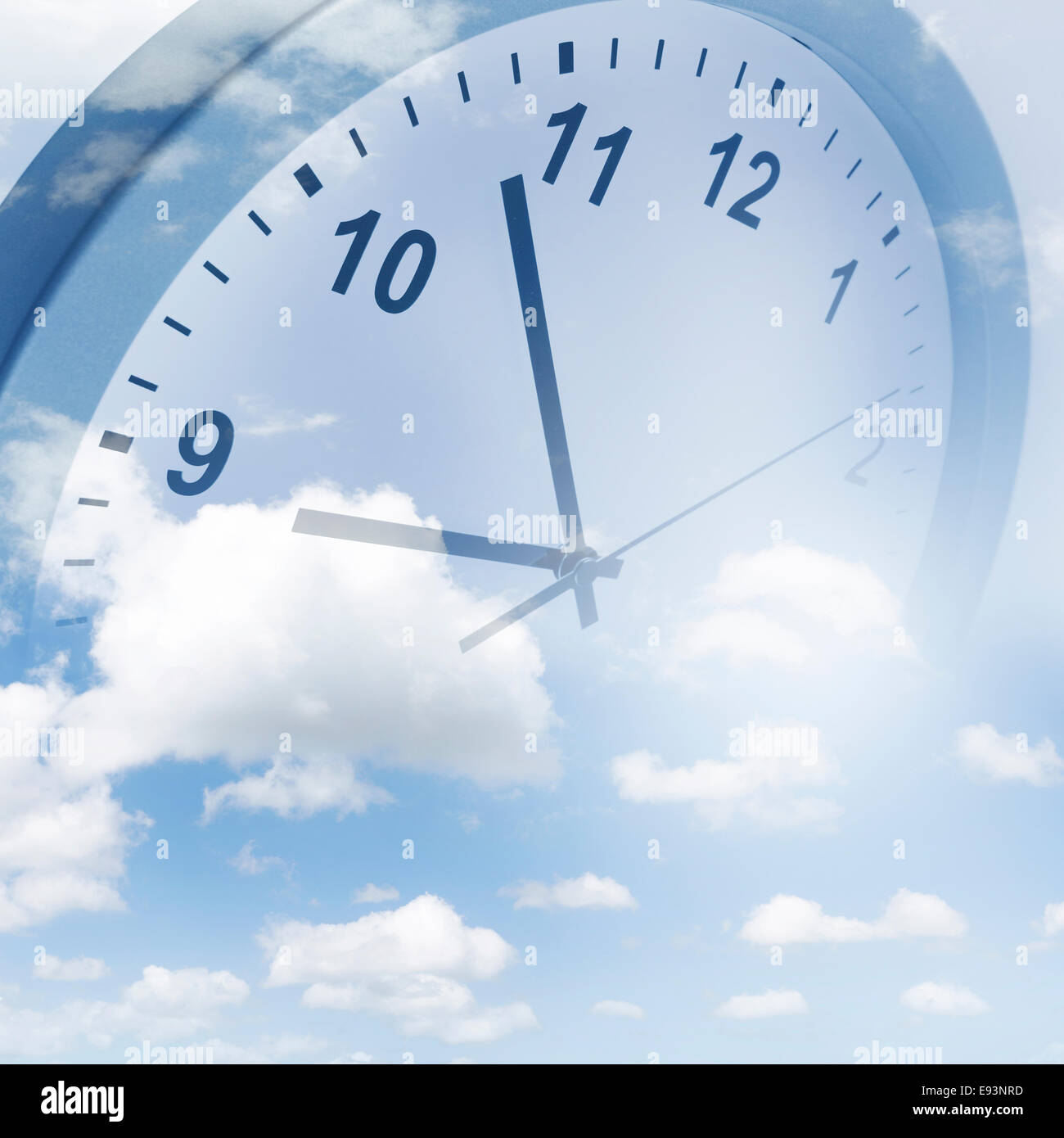 Clock face in blue sky Stock Photo - Alamy