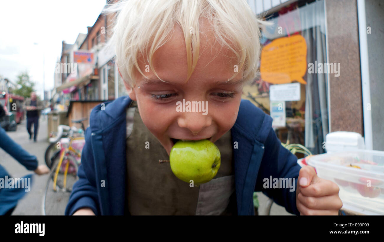 Apple days children boy bobbing apple hi-res stock photography and ...