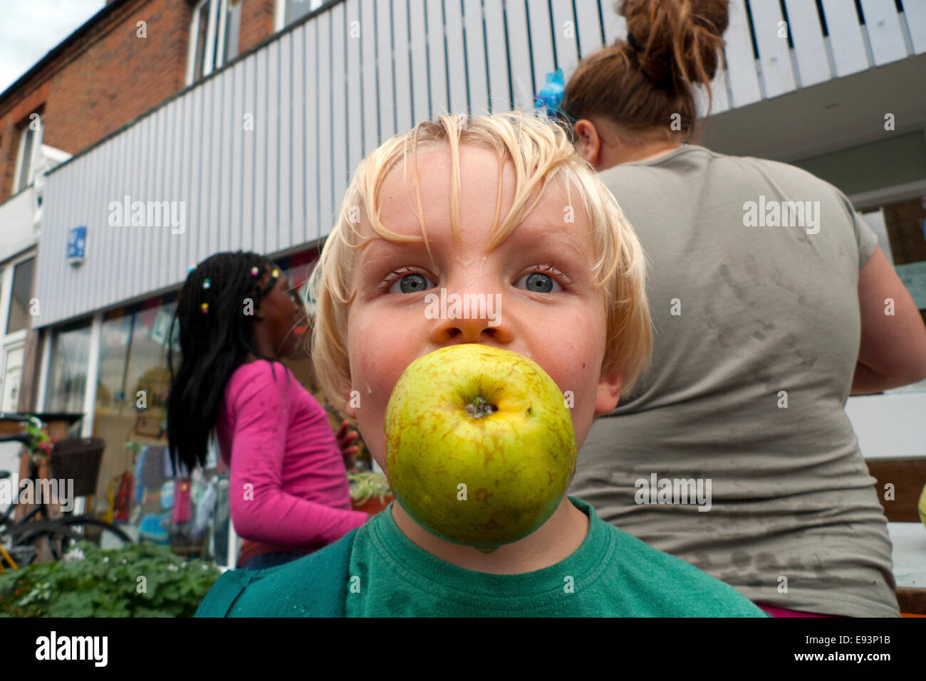 Boy bobbing for apples hi-res stock photography and images - Alamy